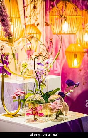Flower table arrangement at corporate party event Stock Photo - Alamy