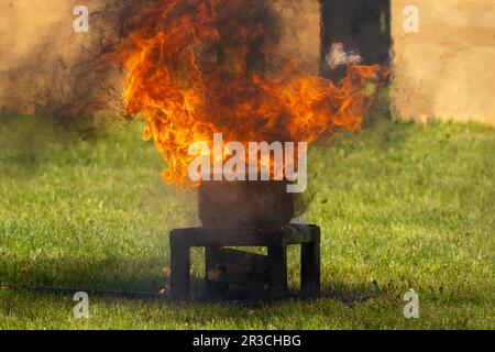 Demonstration of a kitchen fire at a firefighting demonstration Stock ...