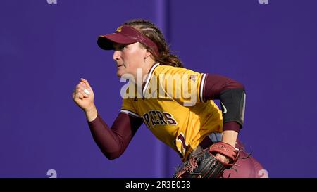 Minnesota outfielder Natalie DenHartog (31) gestures from her position ...