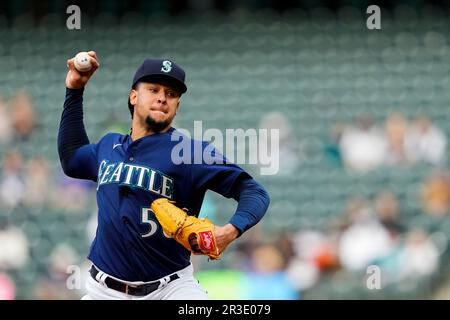 Seattle Mariners starting pitcher Luis Castillo walks in the dugout ...