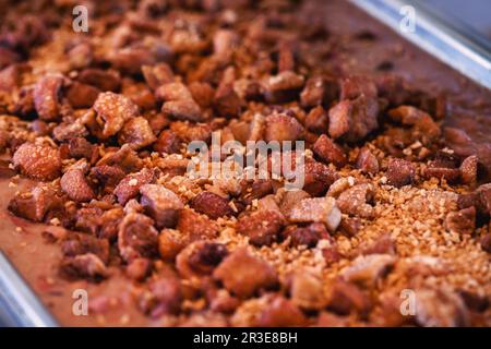 brazilian pork rinds, served buffet style, with onions and other ...