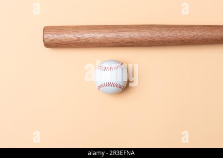 Baseball bat and ball on beige background. Horizontal sport theme ...