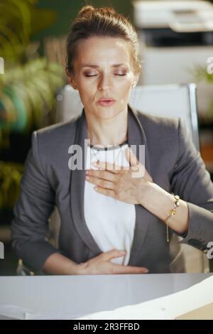 Sustainable workplace. relaxed modern small business owner woman in ...