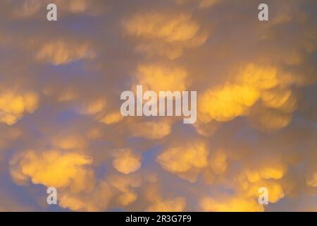 Cumulus and Stratus clouds in dramatic sunset sky over Cape Town South ...