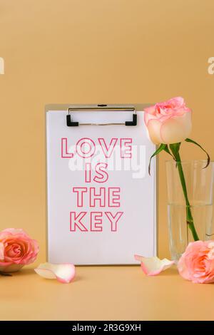 Delicate pink roses on beige background. Minimal trendy composition ...