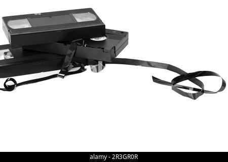 Defective VHS, cassettes, tape spaghetti, white background, copying ...