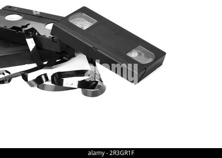 Defective VHS, cassettes, tape spaghetti, white background, copying ...