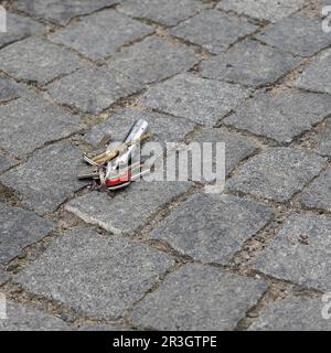 Bunch of keys on ground Stock Photo - Alamy