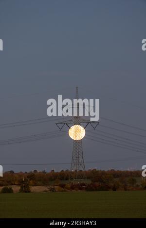 Moon with lattice mast Overhead line Stock Photo - Alamy