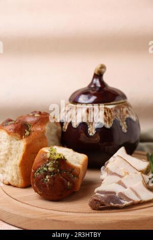 Delicious pampushky (buns with garlic) and salo served for borsch on ...