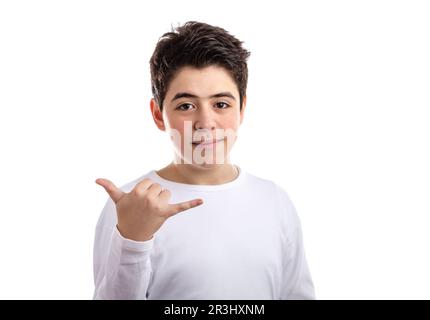 Caucasian Boy doing shaka gesture Stock Photo - Alamy