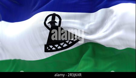 Close-up view of the Lesotho national flag waving. The Kingdom of ...