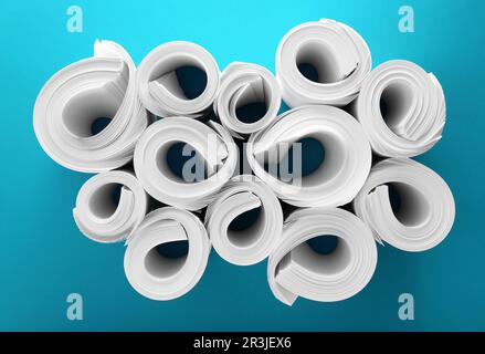 Blank white paper rolls on light blue background, flat lay Stock Photo ...