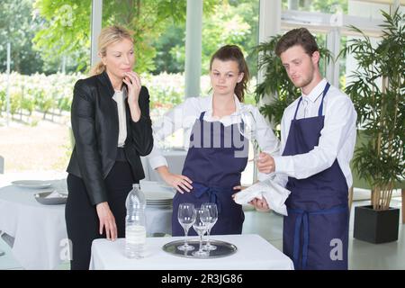 group of waiters at a prestigious restaurant Stock Photo - Alamy