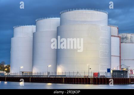 Fuel storage tanks at night seen in Berlin, Germany Stock Photo - Alamy