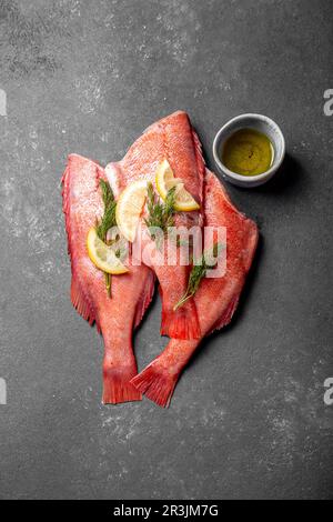 Fresh sea bass fish isolated on white Stock Photo - Alamy