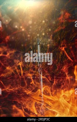 Magic sword on fire background Stock Photo - Alamy