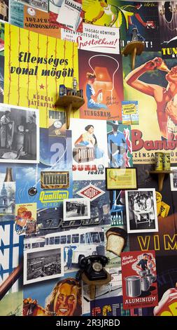 Wall covered with Soviet-era propaganda posters and slogans in ...