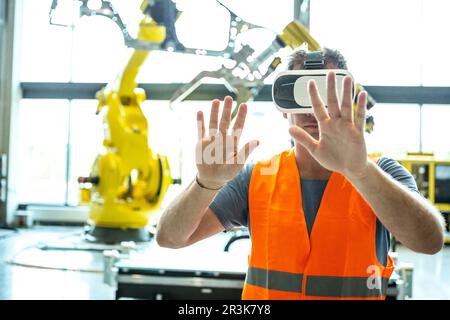 Industrial Robots Remote Control AR Stock Photo - Alamy