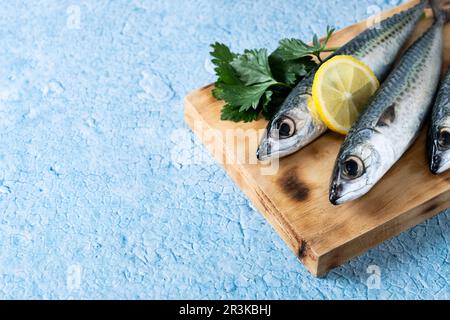 Raw mackerel fish with salt around isolated on white background Stock ...