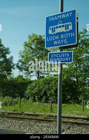 Tram warning sign in South Norwood Park in Croydon, South London Stock ...