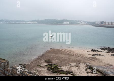 The amphibious duck ferry vehicle negotiates the tidal waters towards ...
