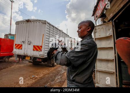 Nairobi, Kenya. 18th May, 2023. Daniel Mwangi, a local cobbler is ...