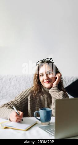 Young student preparing for exams at home Stock Photo - Alamy