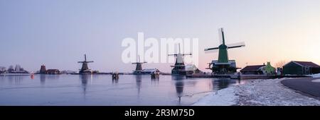 Zaanse Schans windmill village during winter with snow landscape in the ...