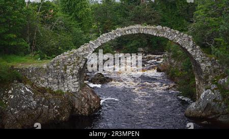 Stone bridge and waterfall in Carrbridge Stock Photo - Alamy