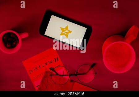 In this photo illustration, the QZone logo is displayed on a smartphone screen Stock Photo - Alamy