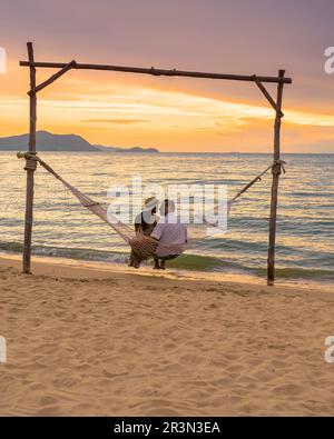 Hammock on the beach of Ban Amphur Beach Pattaya Thailand, a beach with ...