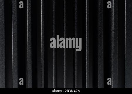 Black metal texture steel radiator mesh.Gray sheet metal with holes ...