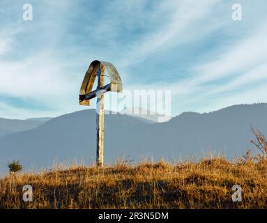 Wooden cross on autumn slope Stock Photo - Alamy