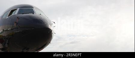 Front section of black business jet, panoramic layout Stock Photo - Alamy