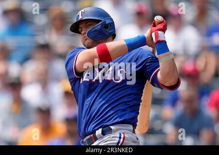 Texas Rangers' Josh Jung follows through on a double against the St ...