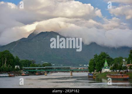A view of river Jehlum and Zabarwan hills during a cloudy evening in ...