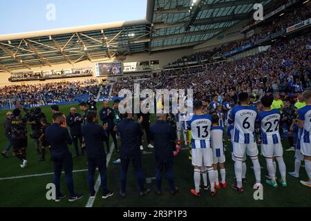 Brighton and Hove Albion players form a huddle before the second half ...