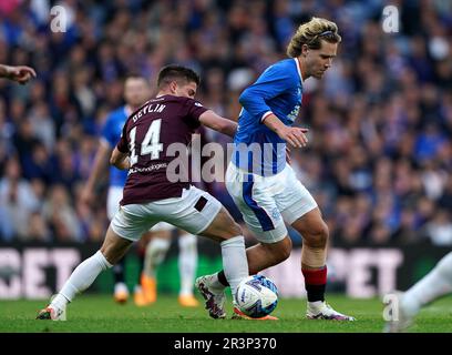 Heart of Midlothian's Cameron Devlin (left) is fouled by Livingston's ...