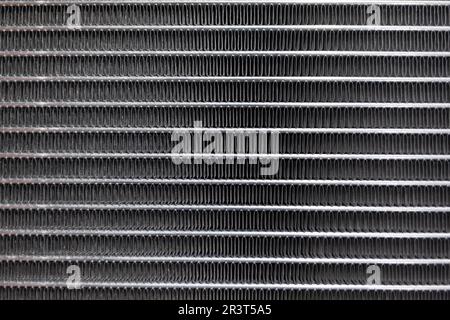Texture of a car radiator. Engine cooler background. Vintage style ...