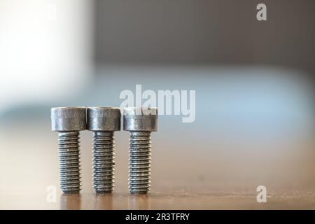 Metal Screws and bolts used to hold machinery together Stock Photo - Alamy