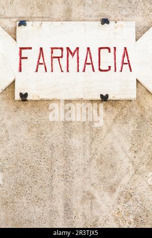 Penza, Tuscany region - Italy. An old pharmacy sign made of stone Stock ...