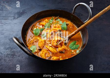 Traditional spicy Indian prawn Madras curry Rogan Josh with king prawns ...
