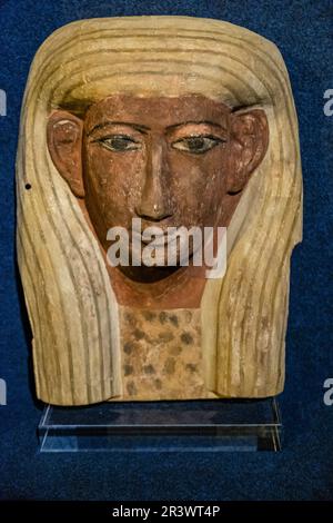 Egyptian anthropomorphic coffin face Stock Photo - Alamy