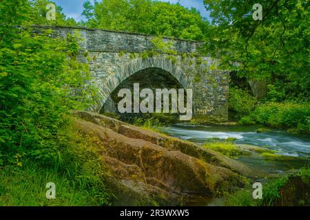 The River Brathay flowing under Skelwith Bridge Stock Photo - Alamy