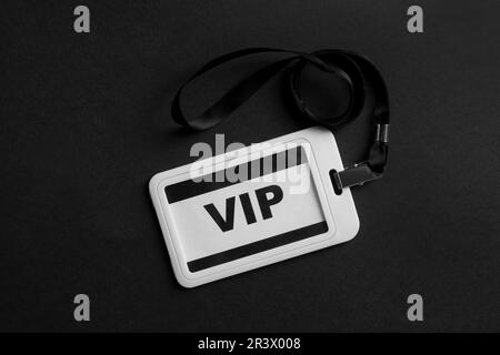 Plastic vip badge on black background, top view Stock Photo - Alamy