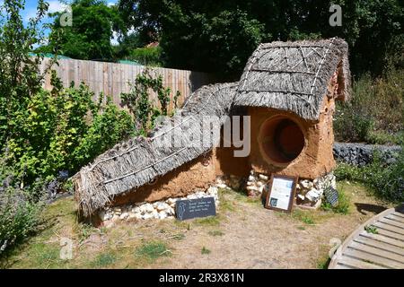 Bug hotel beside the wildlife pond at the RSPB Garden Flatford, Suffolk ...