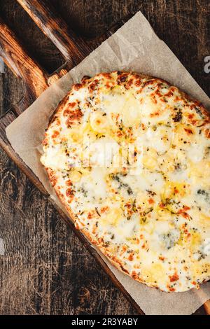 Roman-style pizzas with cheese. Roman square pizza or Pinsa on a thick ...