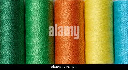 Multicolored sewing threads. Spools of thread for sewing. The concept ...