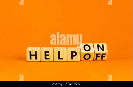 Help on or off symbol. Businessman turns wooden cubes and changes word ...